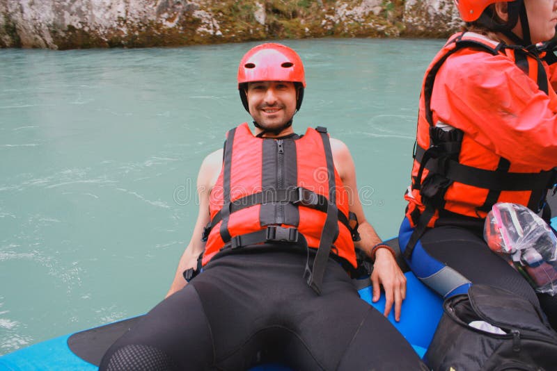 Man with Guide Whitewater Rafting and Rowing on River Stock Photo ...