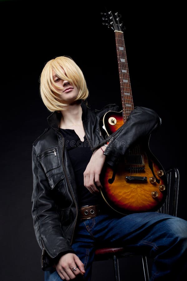 Man - Guitar Player Cosplay Anime Character Stock Image - Image of ...