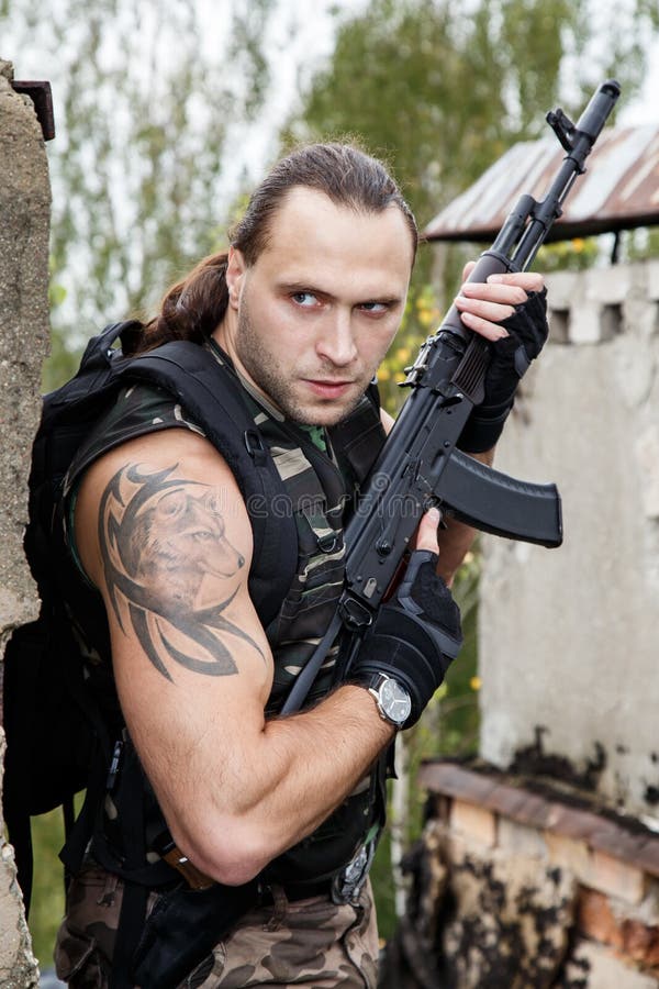 Man with a gun stock photo. Image of rifle, battle, resistance - 47252000