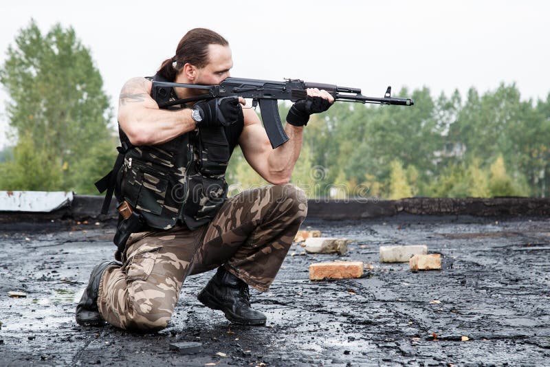 Man with a gun stock photo. Image of battle, assault - 47253270