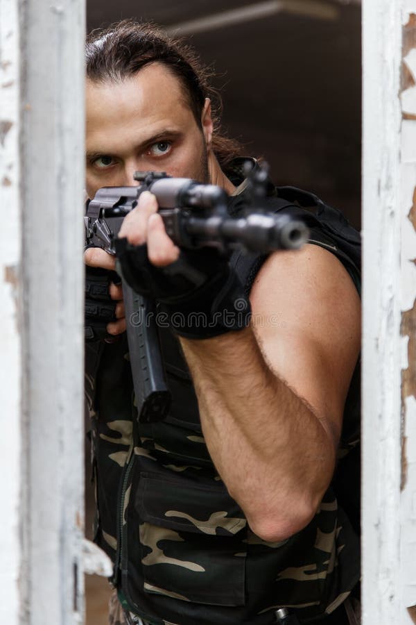 Man with a gun stock photo. Image of radical, assassin - 47253656