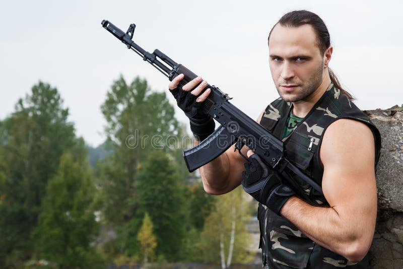 Man with a gun stock image. Image of killer, military - 47254773
