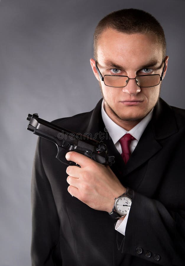 392 Man Holding Gun Head Stock Photos - Free & Royalty-Free Stock ...