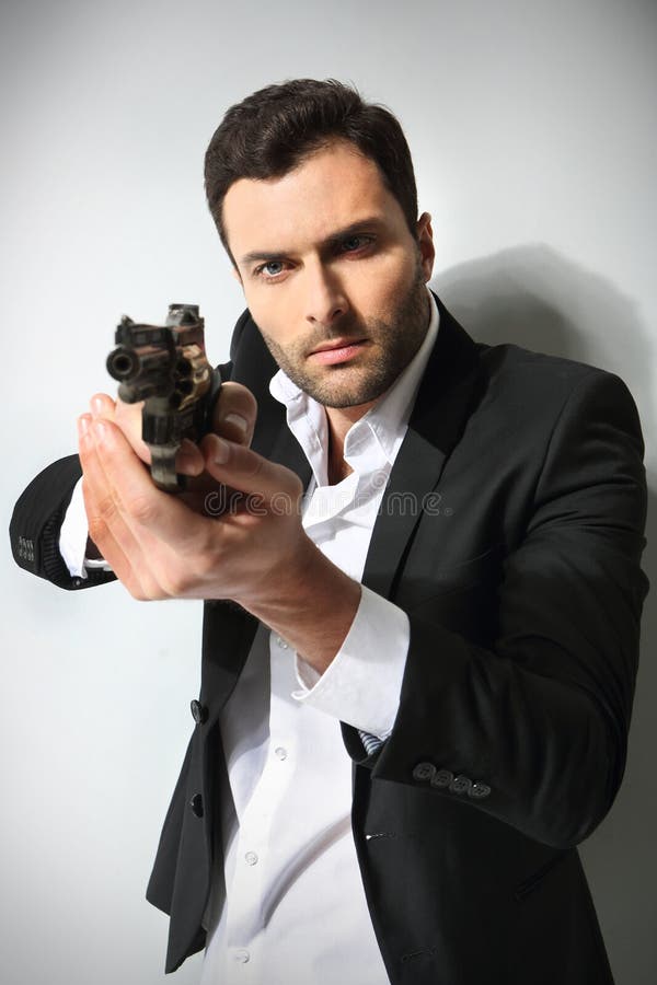 Man with a gun, stock photo. Image of pistol, pointing - 29889868