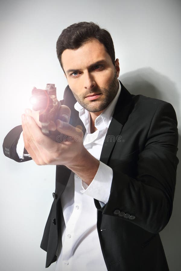 Man with a gun, stock image. Image of murder, death, assassin - 29889935