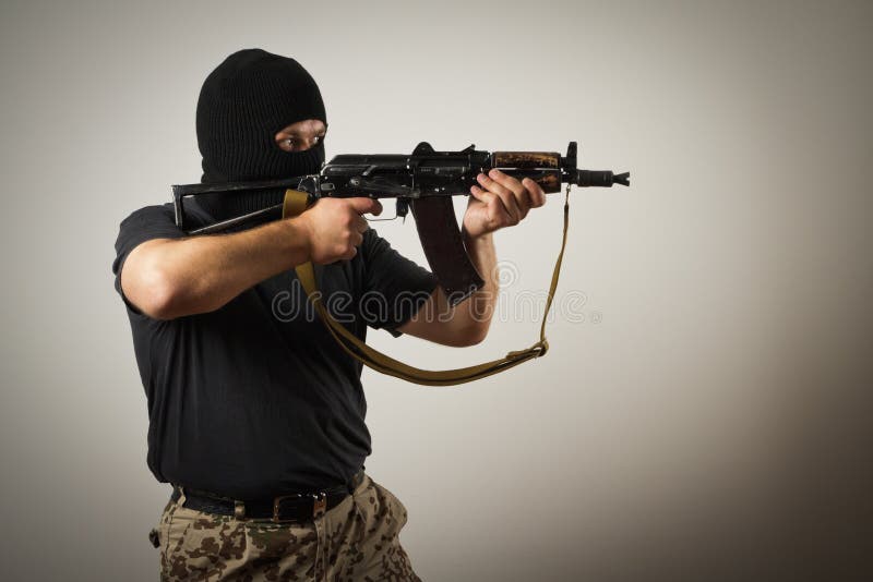 Man with gun stock photo. Image of assassin, face, crime - 42279294