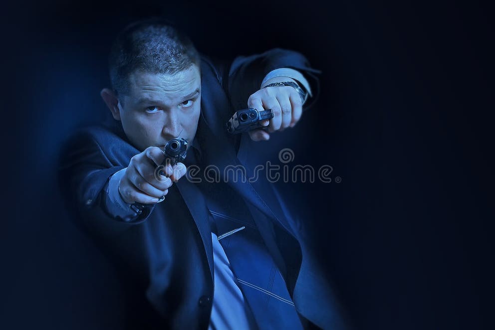 The man with guns stock image. Image of shooting, person - 50906457