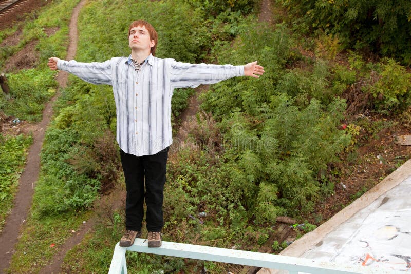 Man Guy is Falling from the Bridge Stock Photo - Image of brown, jumper ...