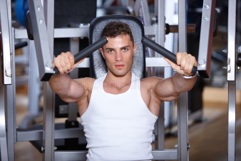 Man at the gym stock image. Image of power, healthy, equipment - 14855139