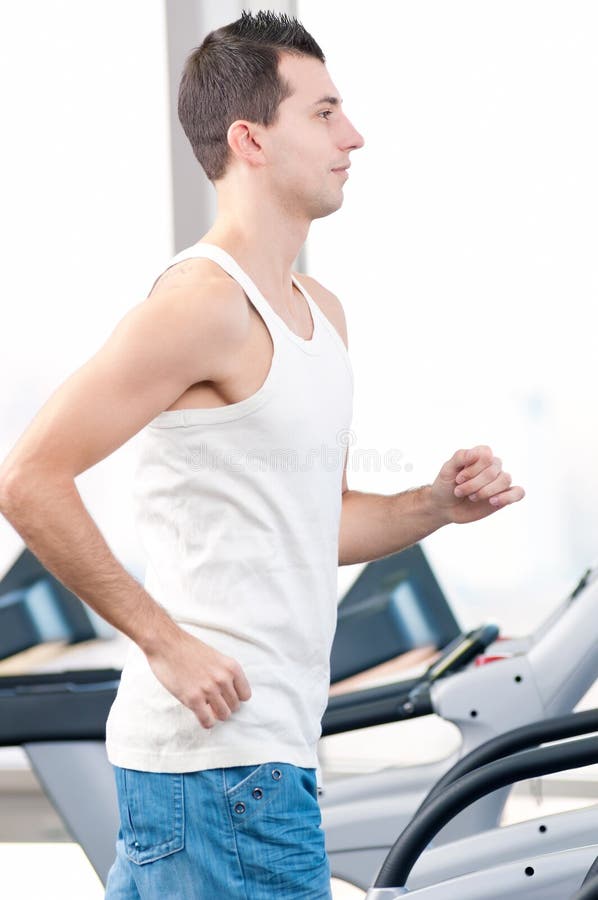 Man at the Gym Exercising. Run. Stock Image - Image of muscular ...