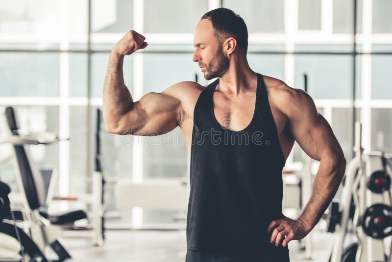 Man at the gym stock image. Image of expression, lifting - 89407459