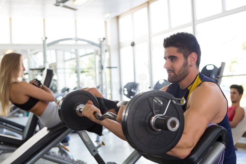 Man at the gym stock image. Image of machine, lifestyle - 39731687