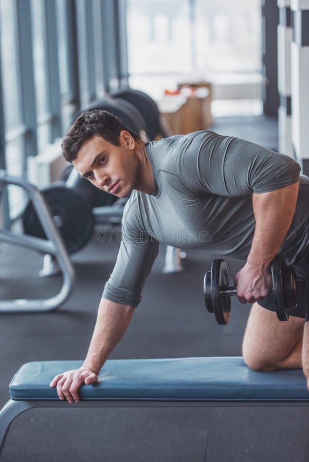 Man in gym stock image. Image of attractive, happy, biceps - 239345663