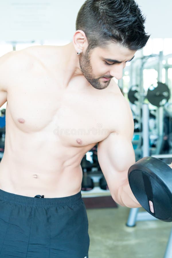 Man at the gym stock image. Image of male, equipment - 39732405