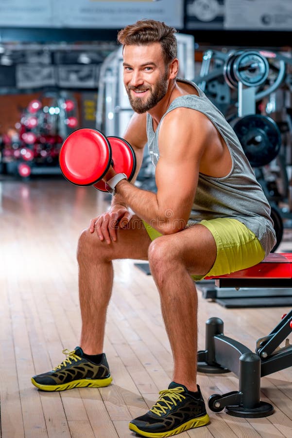 Man in the gym stock image. Image of muscular, indoors - 81777175