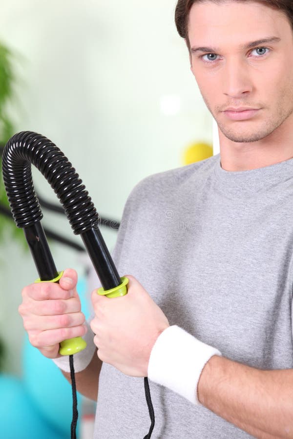 Man at the gym stock photo. Image of exercise, bend, train - 30561430