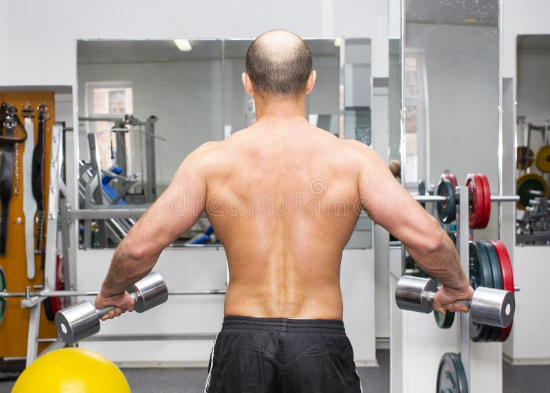 Man at the gym stock image. Image of muscle, muscular - 30902277