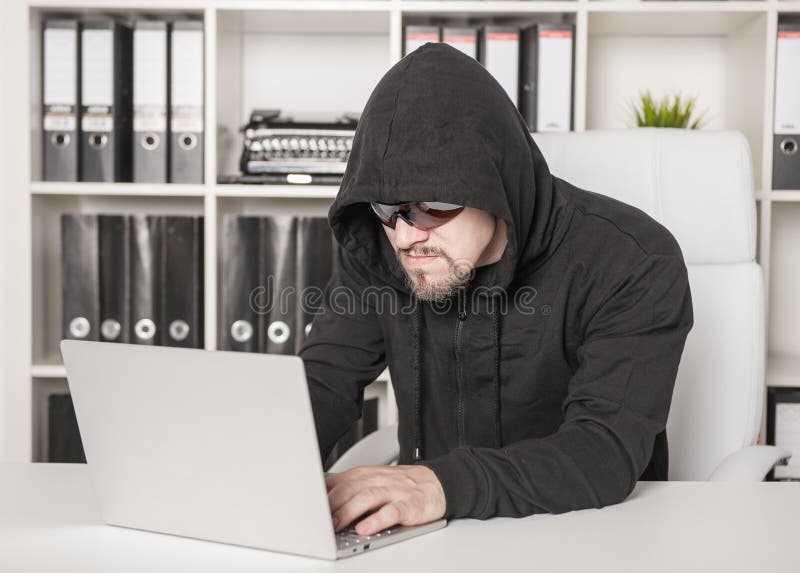 Man Hacker Using Laptop and Breaking Open Password in Office Stock ...