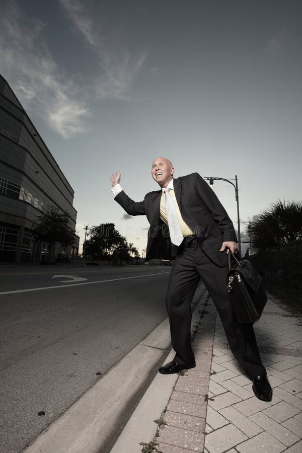 Man Hailing a cab stock image. Image of hail, street, male - 6250189