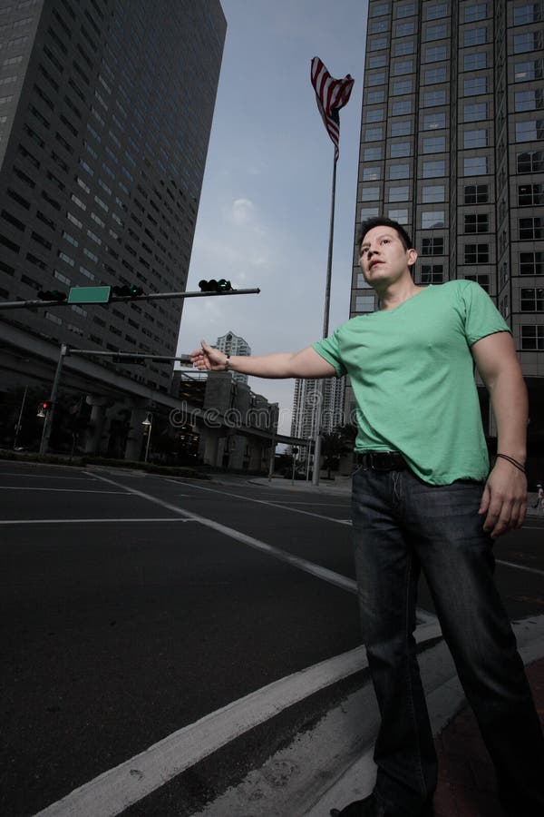 Man Hailing a cab stock image. Image of hail, street, male - 6250189