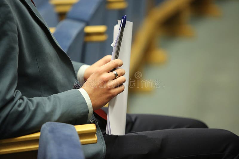 Man in the Hall with Papper Stock Image - Image of jacket, waiting ...