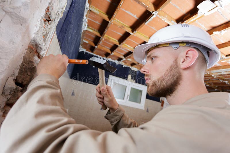 Man with hammer and chisel stock photo. Image of wood - 254430388