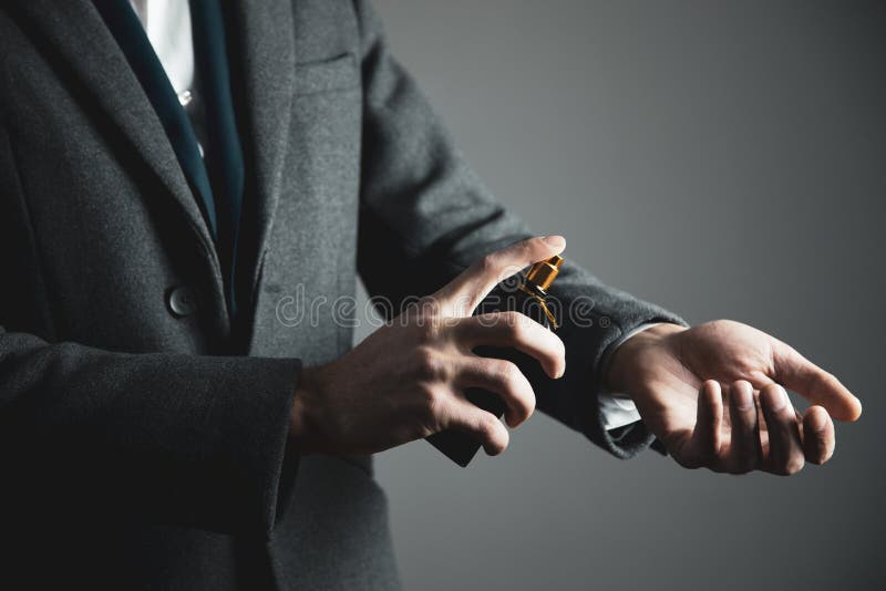 Man Hand Bottle of Perfume in Hand. Stock Photo - Image of style ...