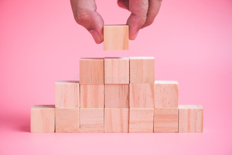 Man Hand Building Stack of Wood Cube Building Blocks Stock Photo ... Man Hand Building Stack of Wood Cube Building Blocks Stock Photo ...