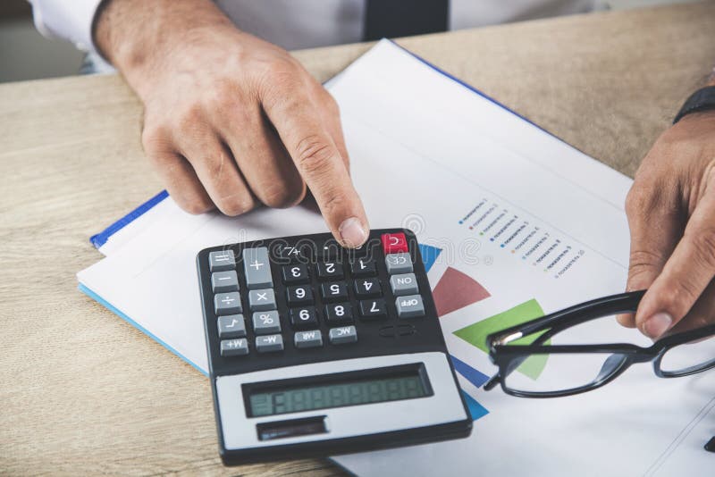 Man Hand Calculator on Graph Stock Image - Image of desk, budget: 175913291