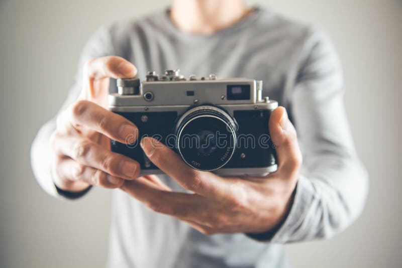 Man hand camera stock photo. Image of lens, retro, adult - 206374920