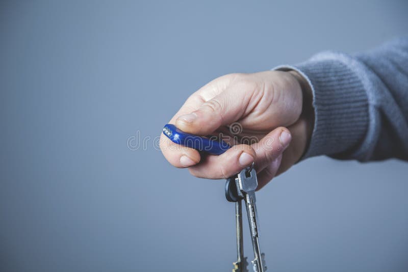 Man hand car key stock image. Image of dealer, giving - 171585045