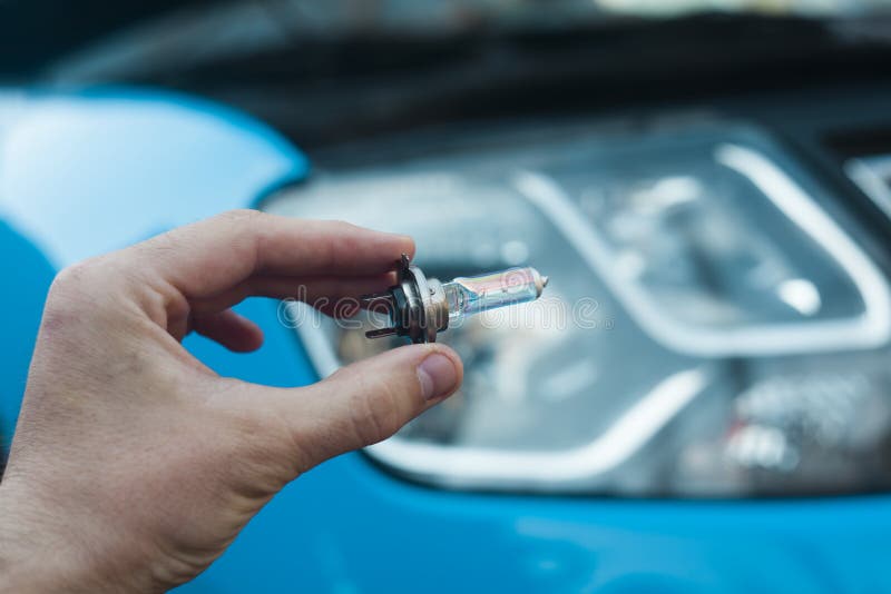 Man Hand Changing Light Bulb on Car Stock Image - Image of electric ...
