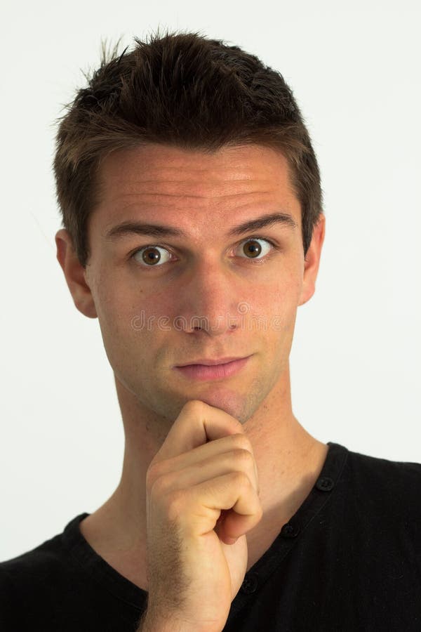 Man with Hand on Chin Looking Suprised Stock Image - Image of person ...