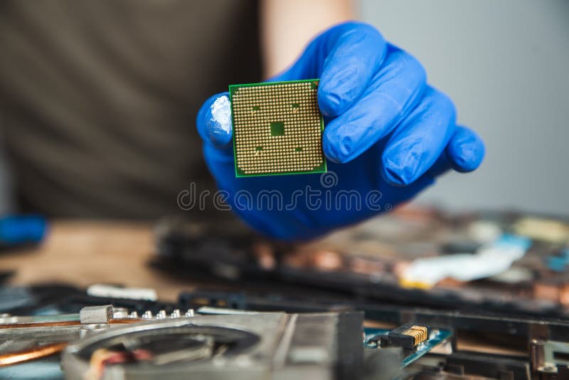 Man Hand Chip with Computer on Desk. Stock Image - Image of closeup ...