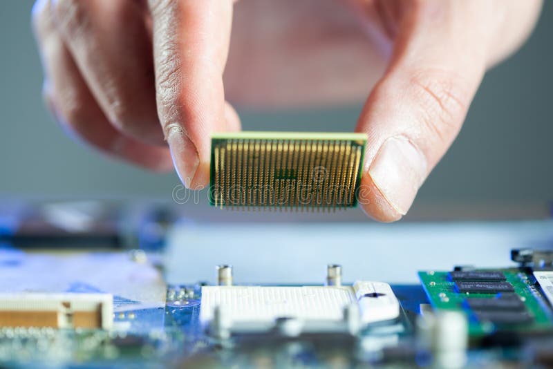 Man Hand Chip with Computer on Desk. Stock Photo - Image of technician ...