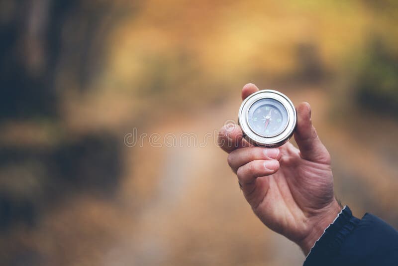 Man Hand Compass in Autumn Forest Stock Photo - Image of exploration ...