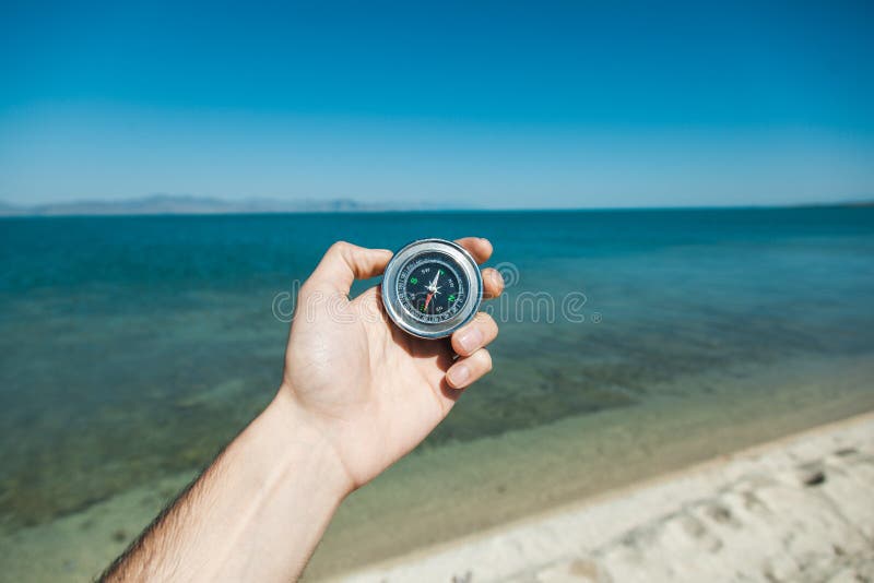 Compass on the coast stock photo. Image of exploration - 15293526