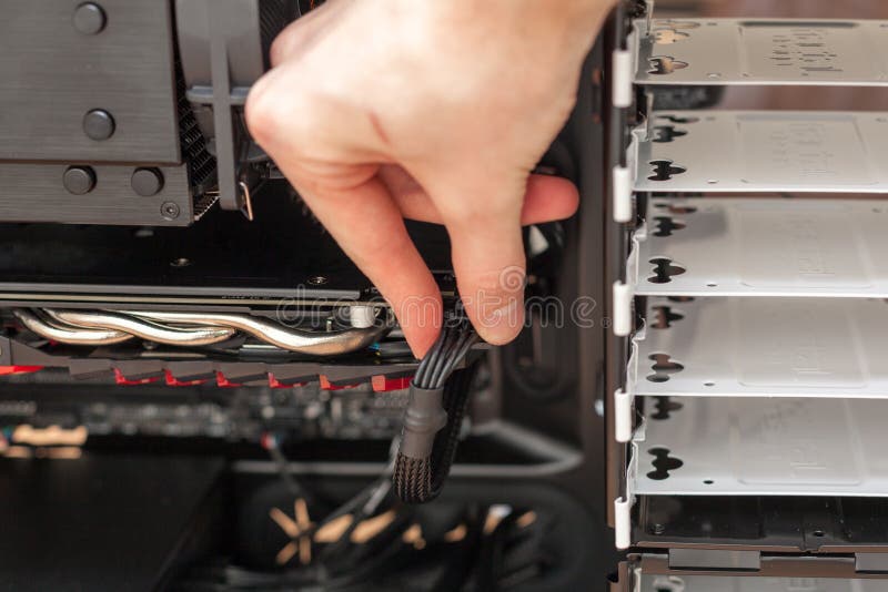Man Hand Connecting the Power Supply To the Graphics Card. Stock Photo ...