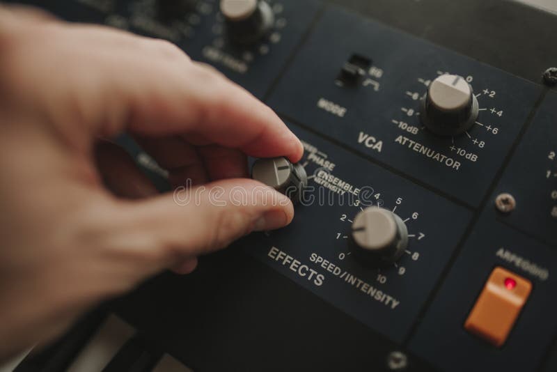 Man Hand Controlling Musical Keyboard Buttons while Playing Music ... Man Hand Controlling Musical Keyboard Buttons while Playing Music ...
