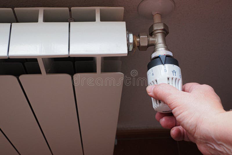 Man Hand Controlling the Temperature on Radiator Stock Photo - Image of ...
