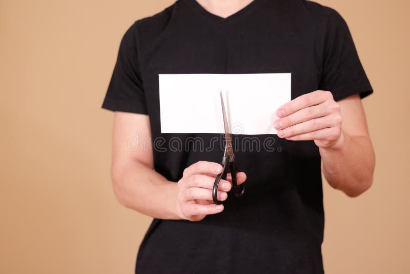 Man Hand Cut White Paper with Scissors. Stock Photo - Image of torn ...