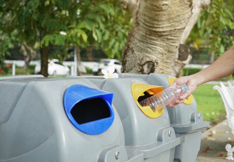 Man Hand Discarded Plastic Bottle in Waste Sorting Bin after Workout ...