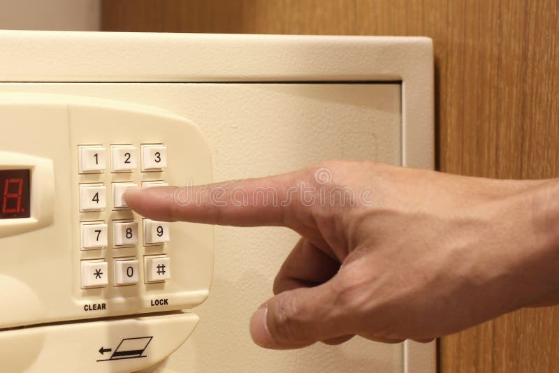 Man Hand Entering Code of Safe Box Stock Photo - Image of code, finger ...