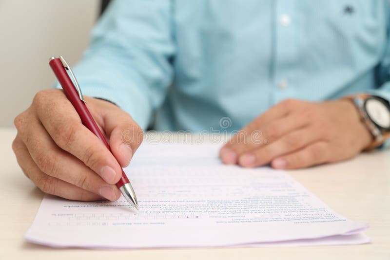 Man Hand on the Form with Pen Stock Photo - Image of form, educate ...