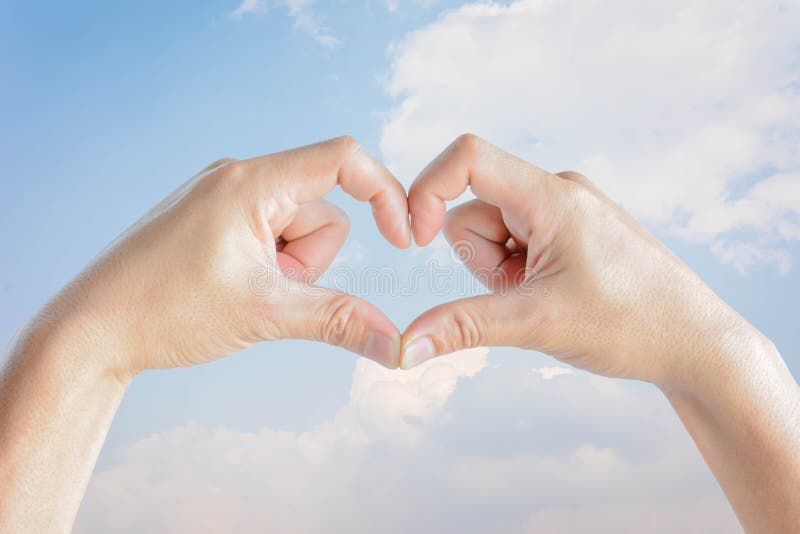 Man hand forming a heart stock photo. Image of grace - 69969240