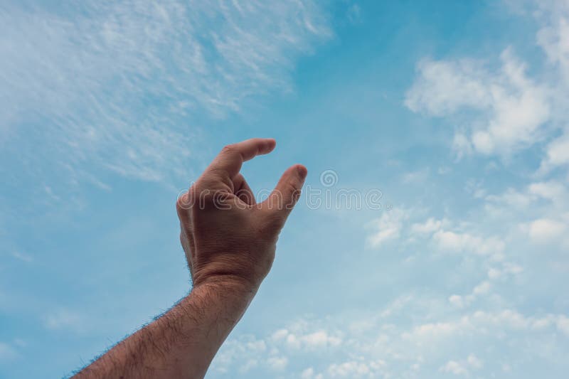 Man Hand Gesturing on the Blue Sky Stock Photo - Image of palm, raised ...