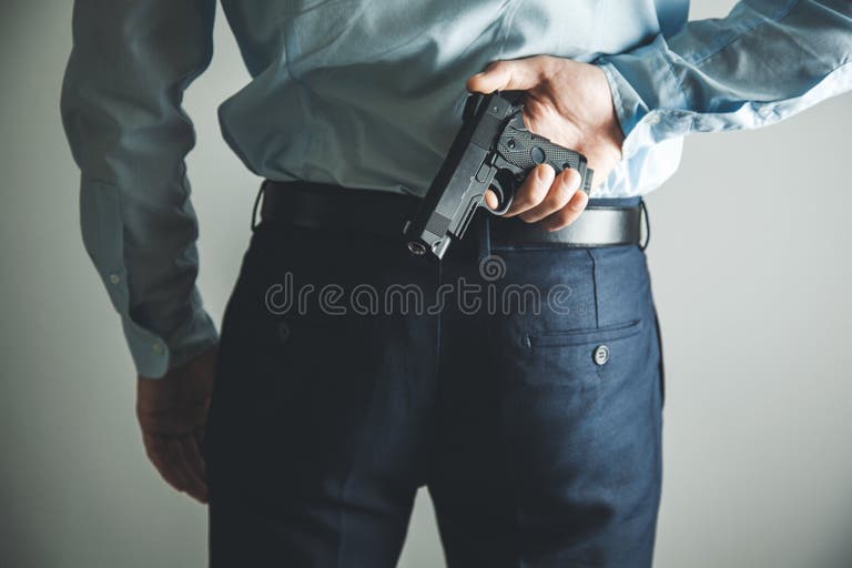 127 Back View Man Holding Gun Stock Photos - Free & Royalty-Free Stock ...