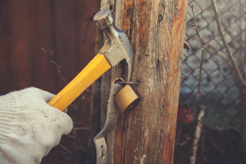 Hand hammer with door lock stock photo. Image of work - 142718856