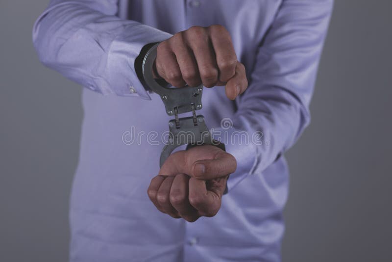 Handcuffs in the Back Pocket,arrest for a Crime Stock Image - Image of ...
