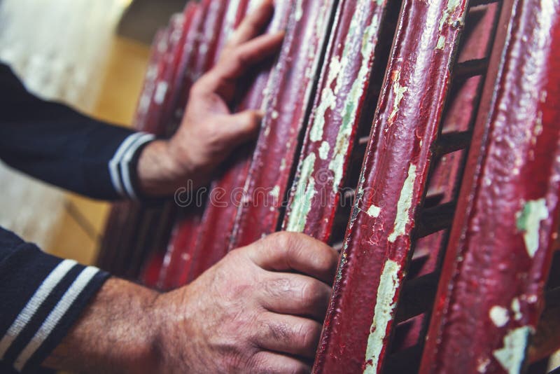 Man hand in Heating System stock photo. Image of wall - 165198428